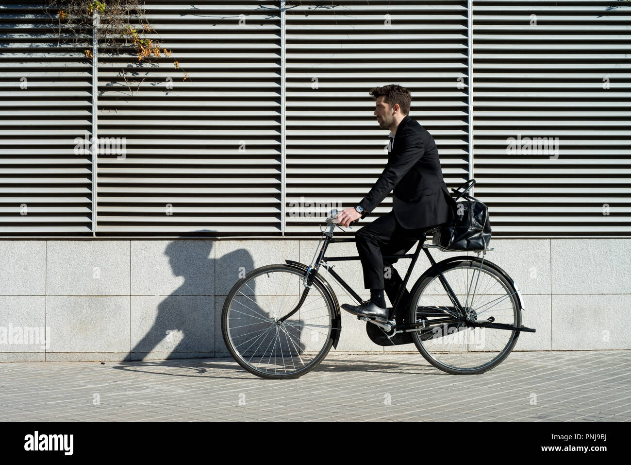 man in vintage bicycle Stock Photo - Alamy