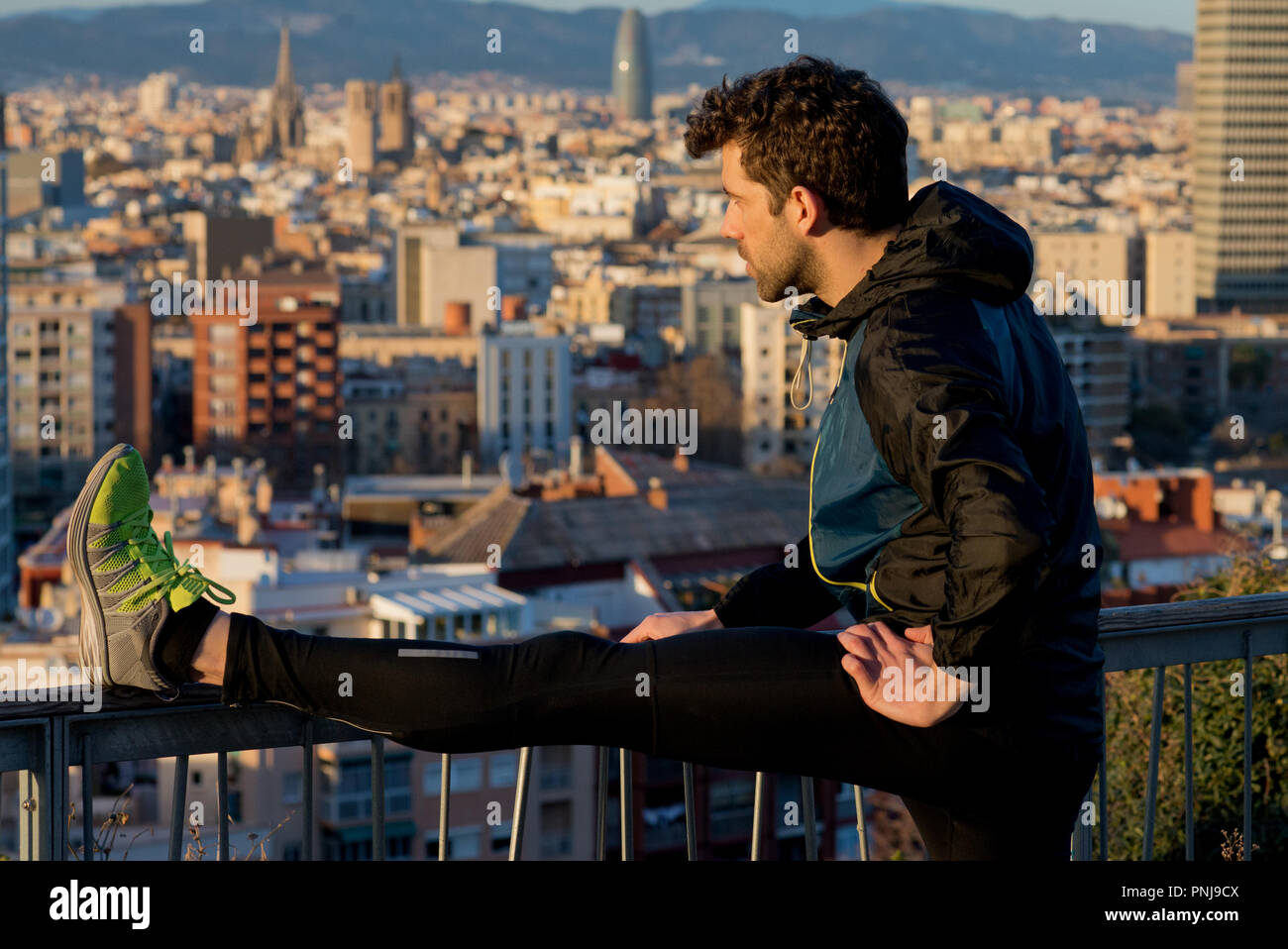 Runner stretching hi-res stock photography and images - Alamy