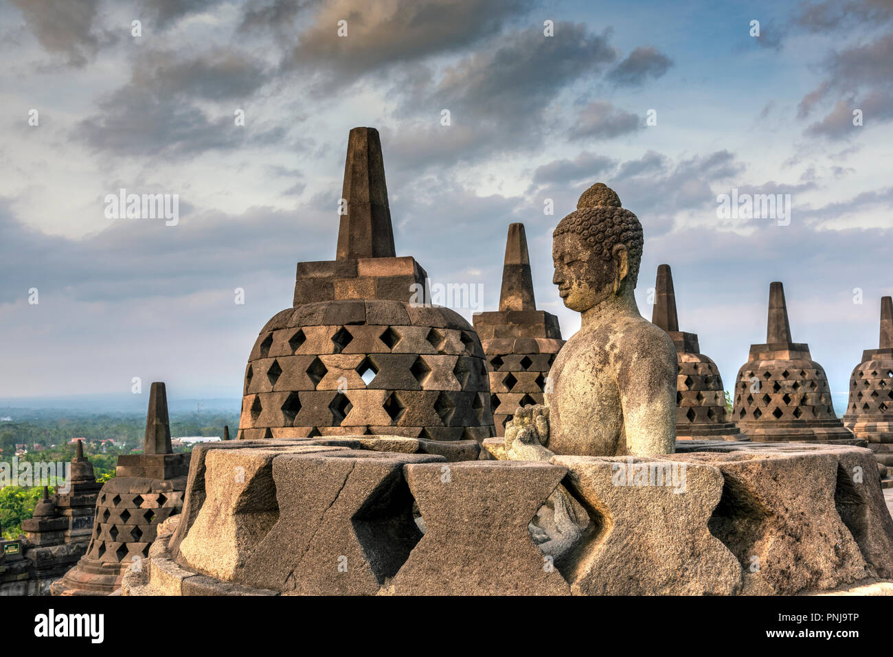 Buddha statue, Candi Borobudur buddhist temple, Muntilan, Java ...