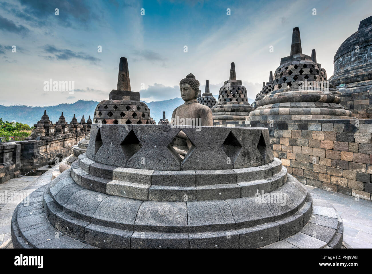 Buddha statue, Candi Borobudur buddhist temple, Muntilan, Java ...