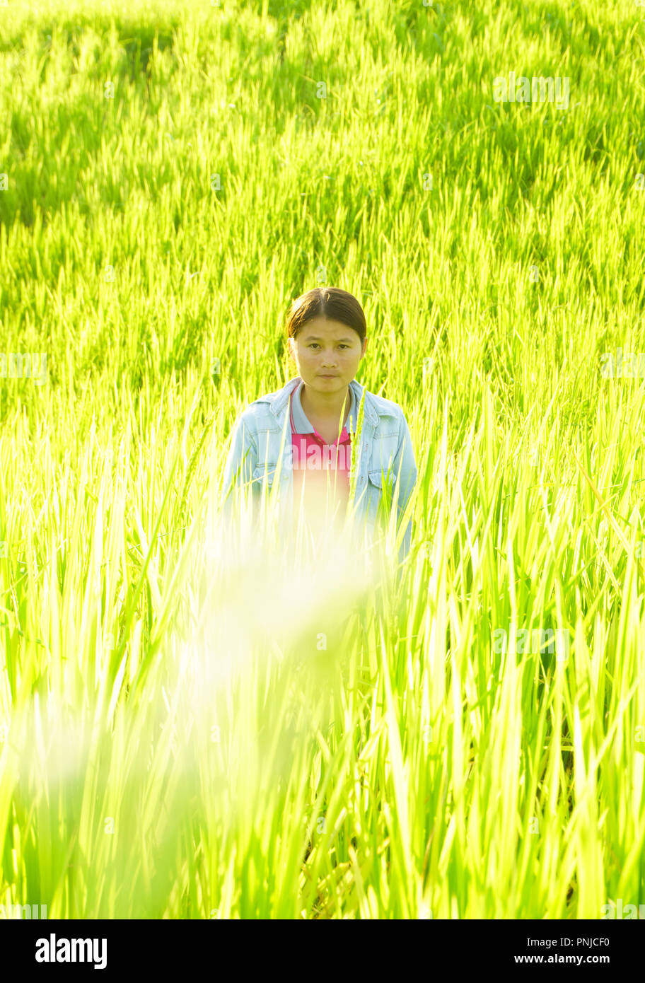 The woman wore a white shirt and hand hi-res stock photography and ...