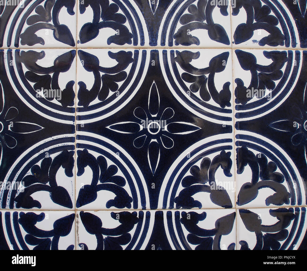 Detail of the traditional tiles from facade of old house. Decorative ...