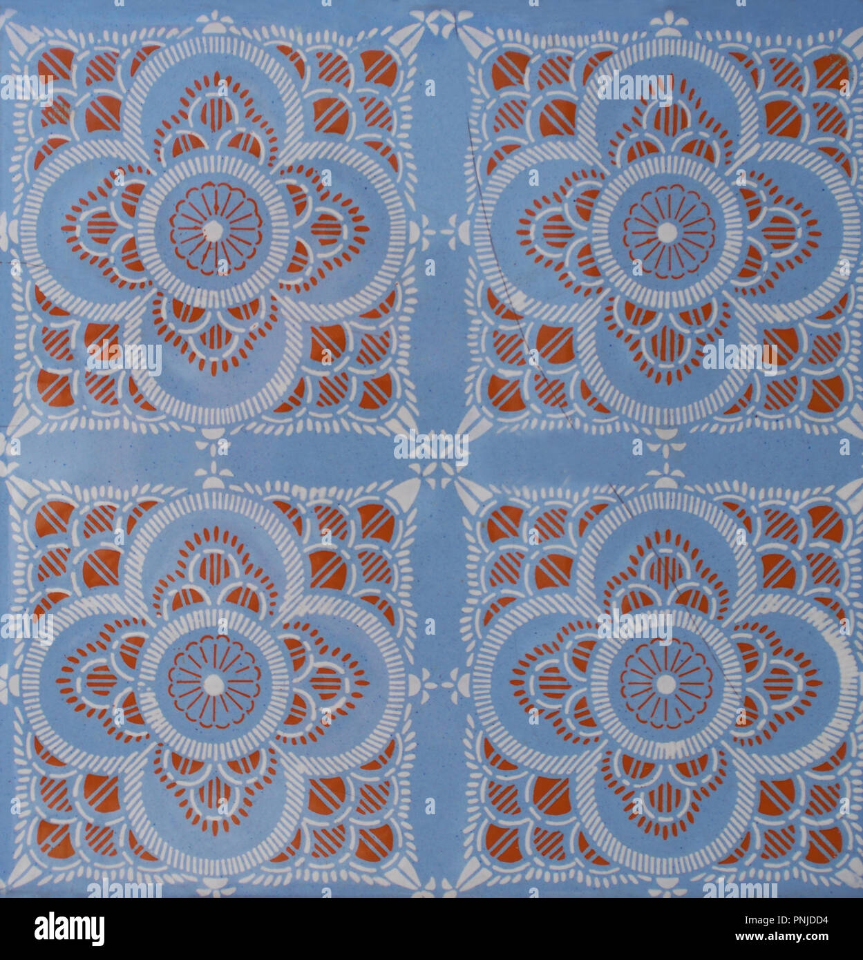 Detail of the traditional tiles from facade of old house. Decorative ...