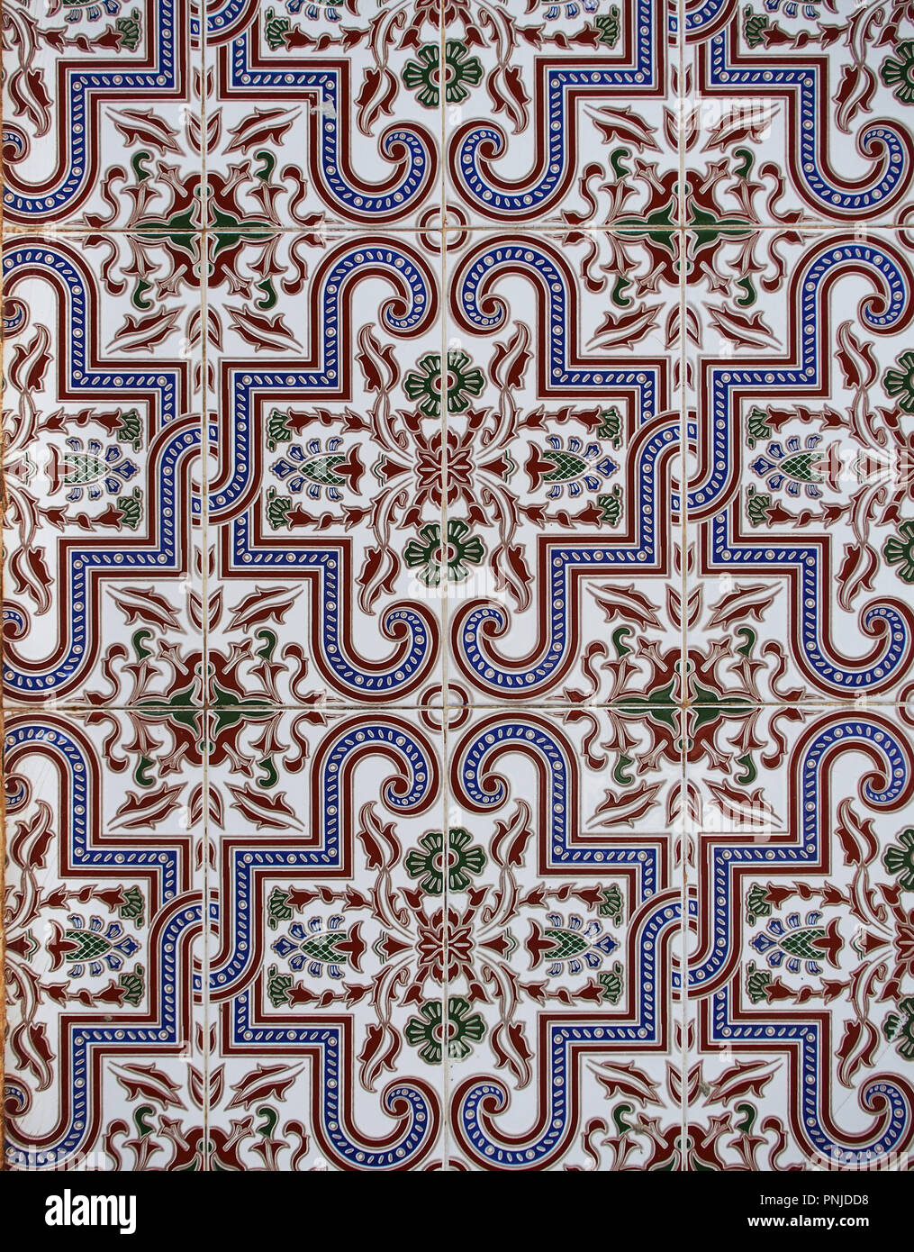 Detail of the traditional tiles from facade of old house. Decorative ...