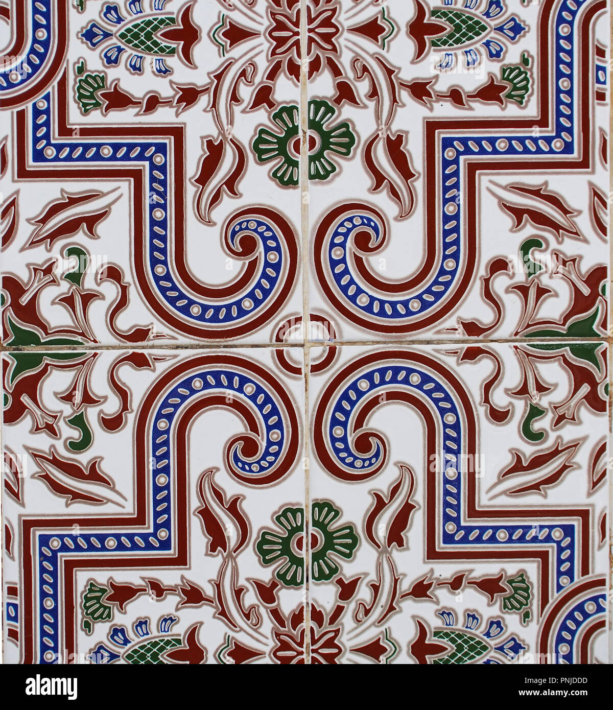 Detail of the traditional tiles from facade of old house. Decorative ...