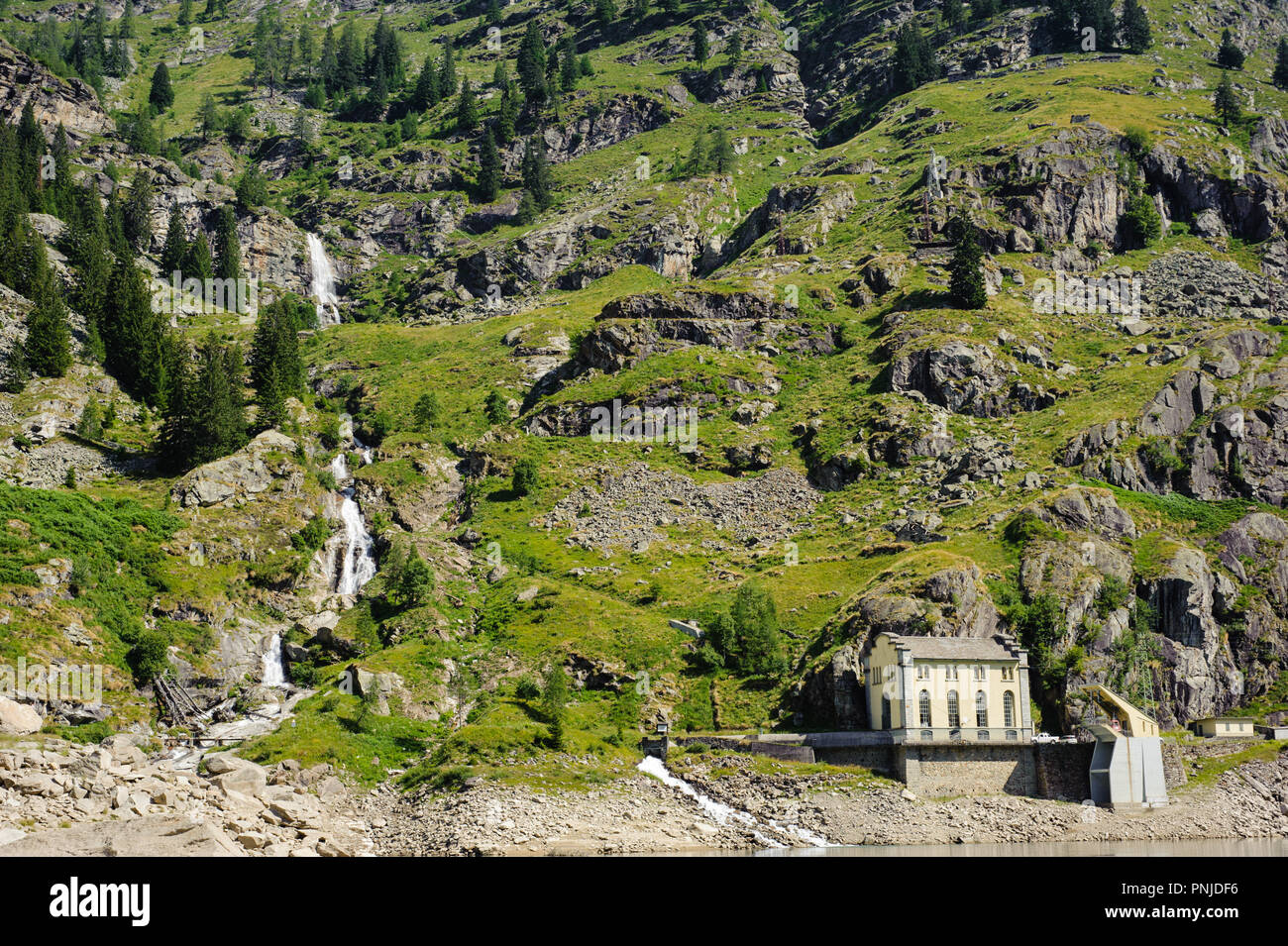 Ancient hydroelectric power station in the mountain historical building ...