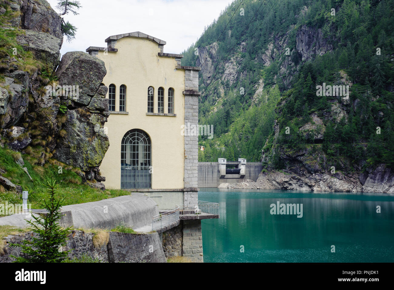 Ancient hydroelectric power station in the mountain historical building ...