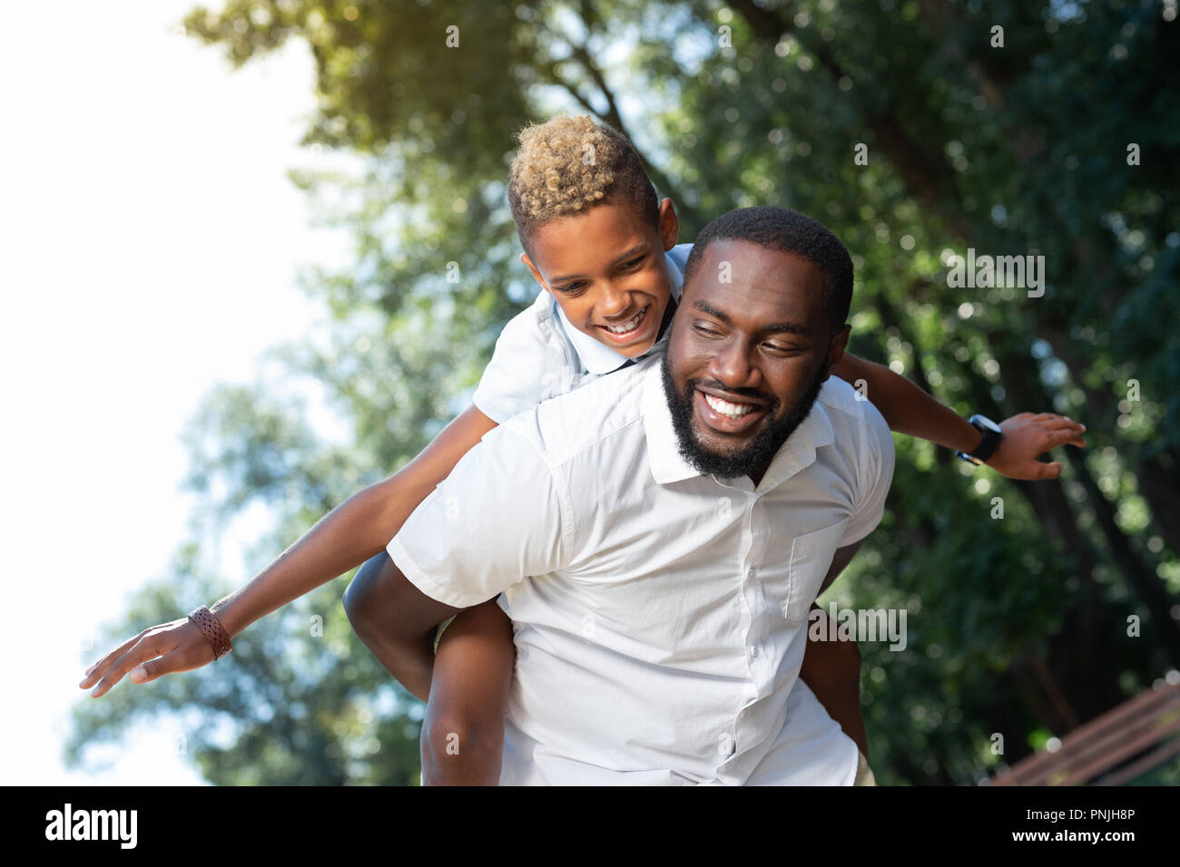 Joyful happy man having a great day off Stock Photo - Alamy