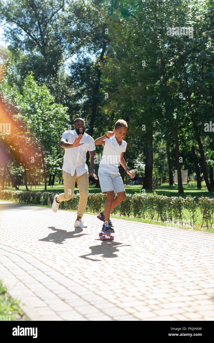 Man running after child hi-res stock photography and images - Alamy