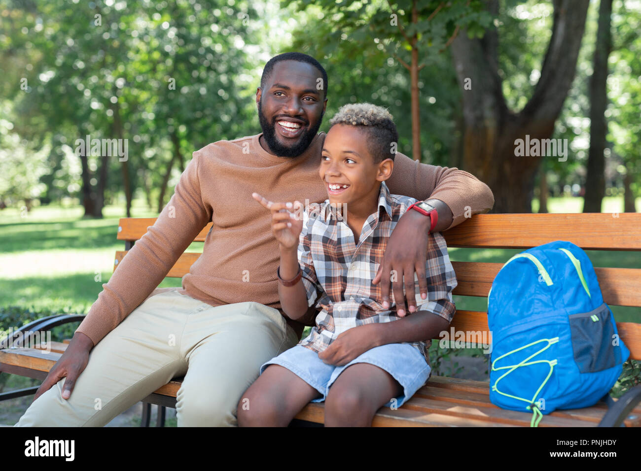 Happy boy pointing hi-res stock photography and images - Alamy