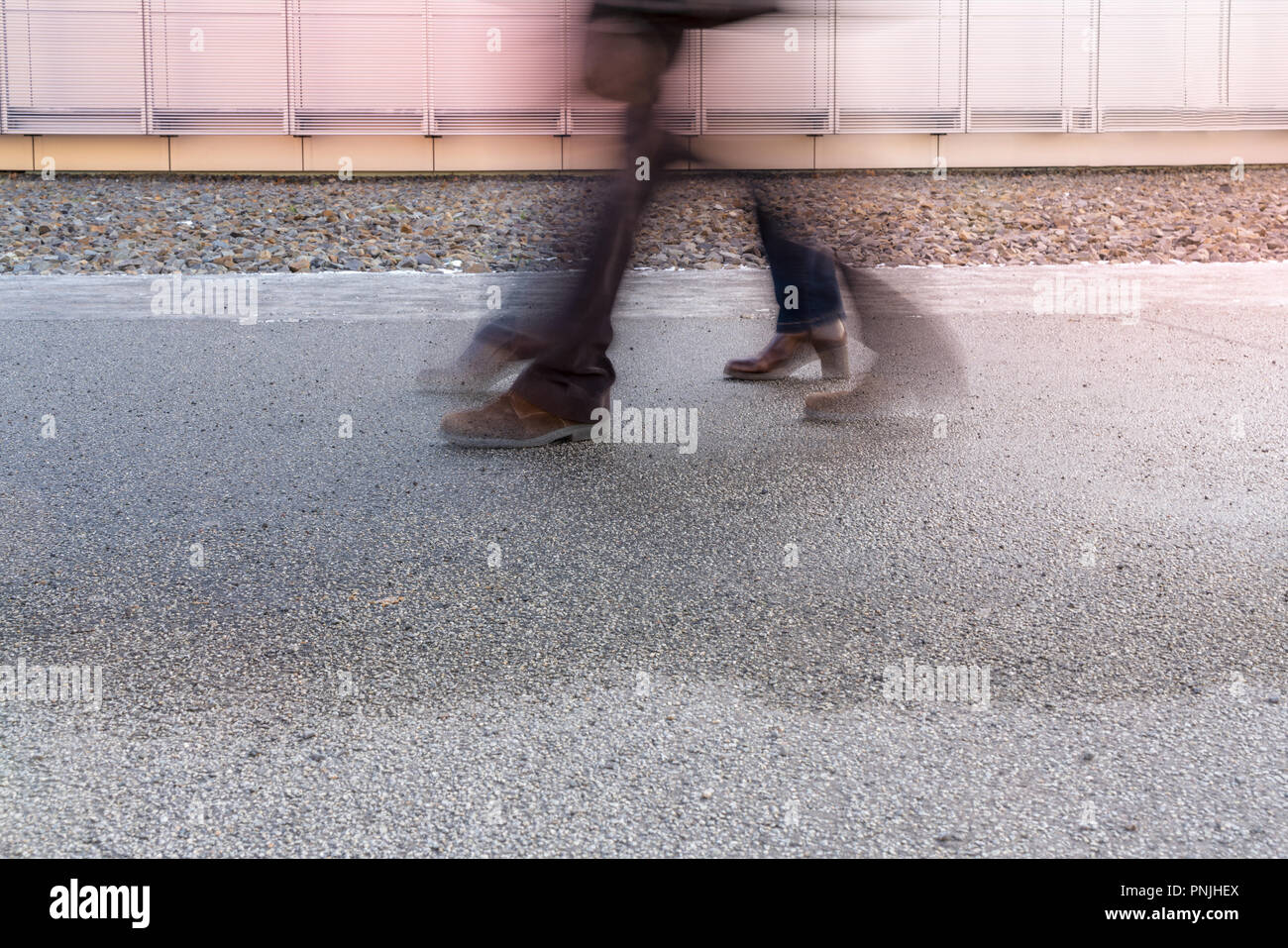 Two pairs legs walking hi-res stock photography and images - Alamy