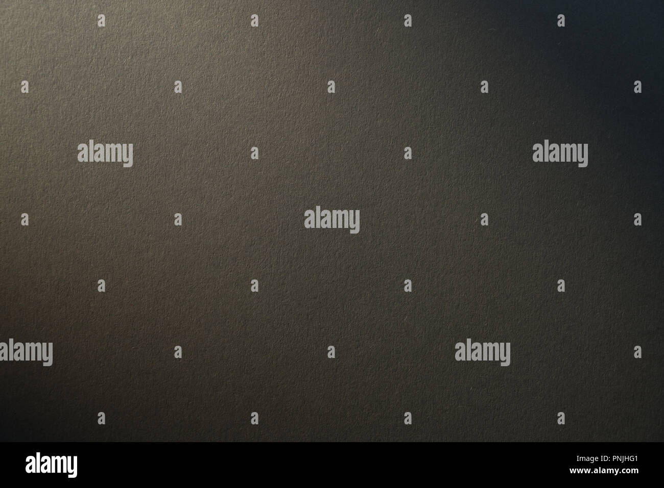 light gradient on a grey cardboard background Stock Photo - Alamy