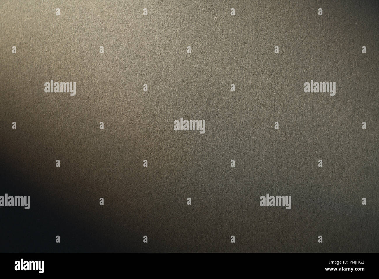 light gradient on a grey cardboard background Stock Photo - Alamy