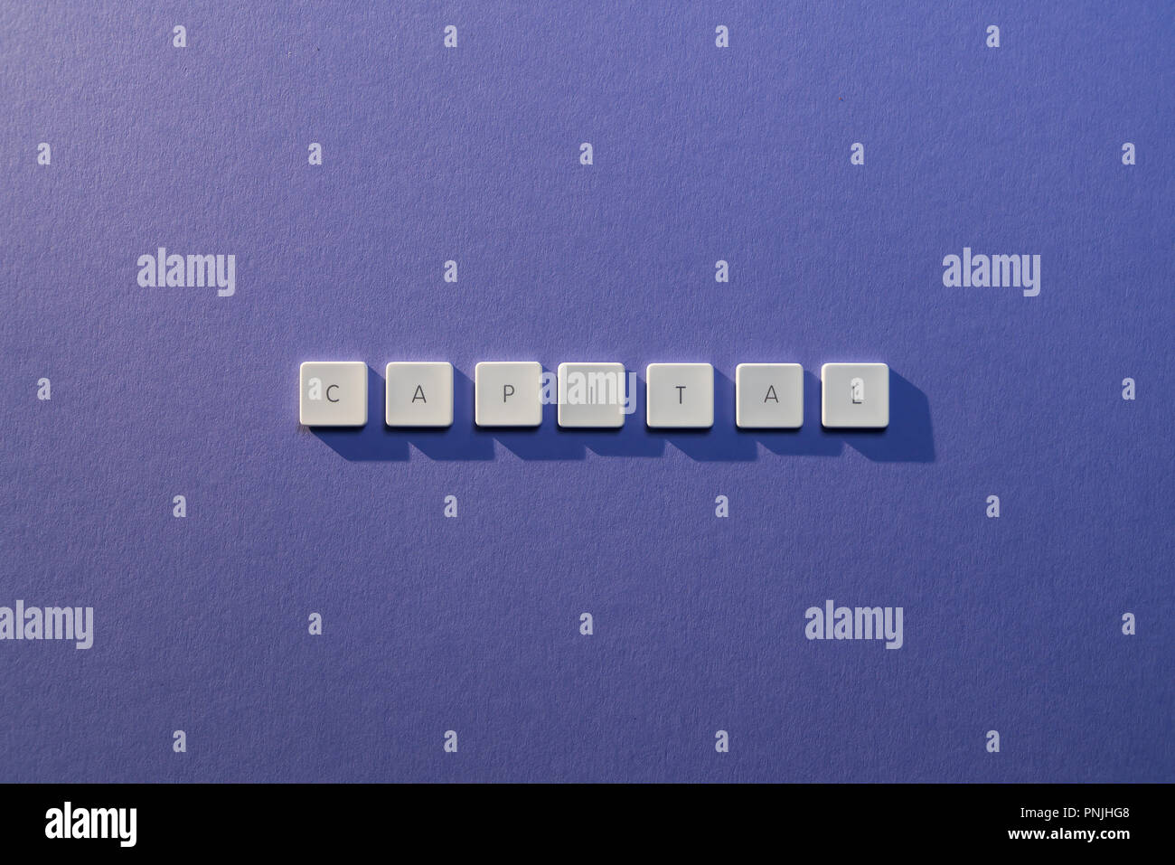 description of the word Capital with keyboard letters Stock Photo - Alamy