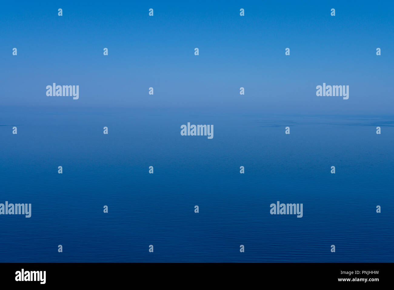misty blue ocean landscape for backgrounds Stock Photo - Alamy