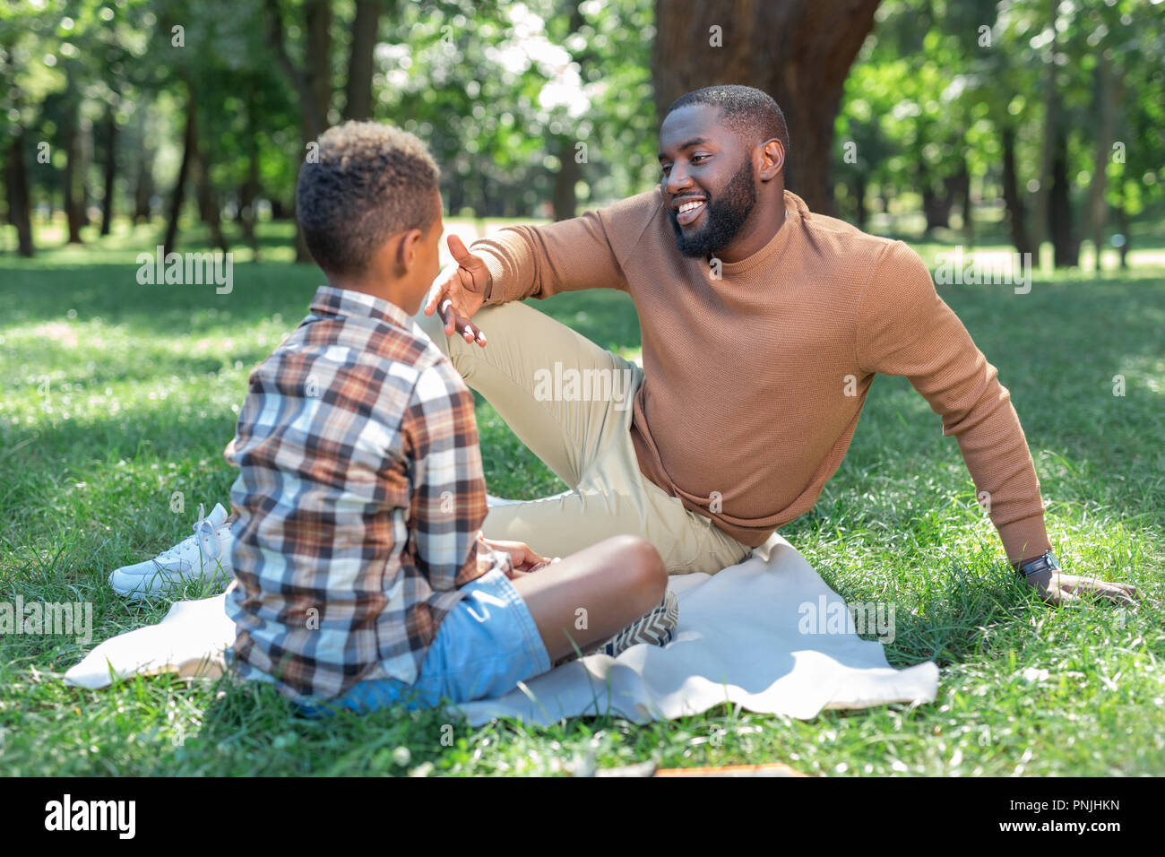 Speaking to children hi-res stock photography and images - Alamy