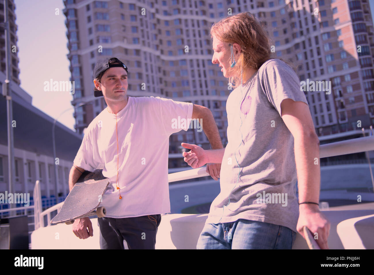 Pleased male person talking to his best friend Stock Photo - Alamy