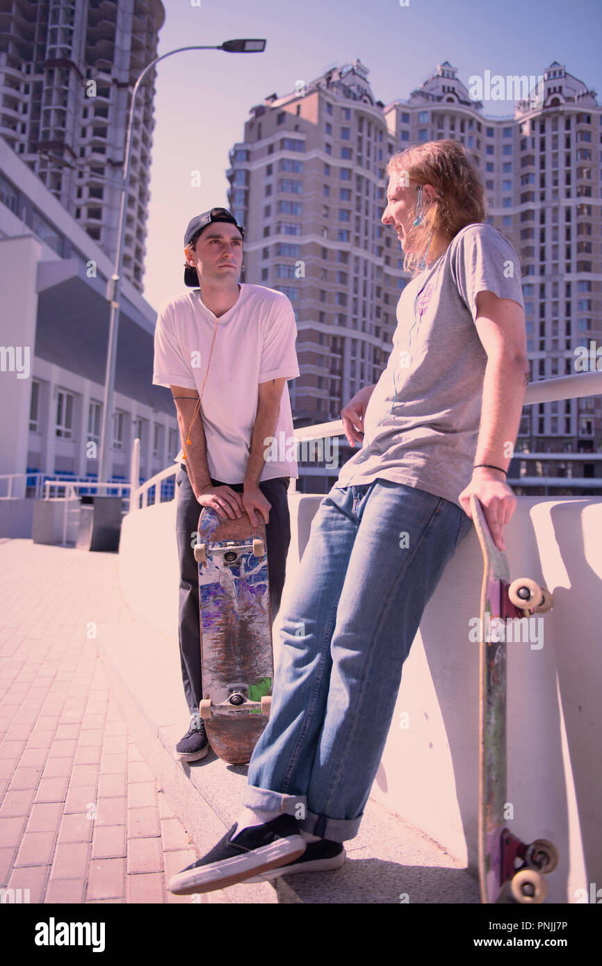 Cheerful male person standing opposite his partner Stock Photo - Alamy