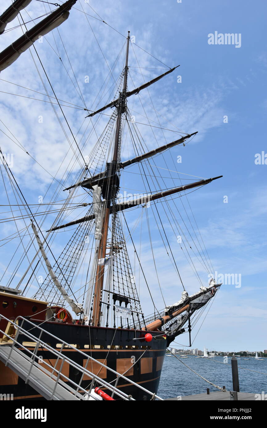 A sailing ship in Boston Harbor against the downtown skyline as seen ...