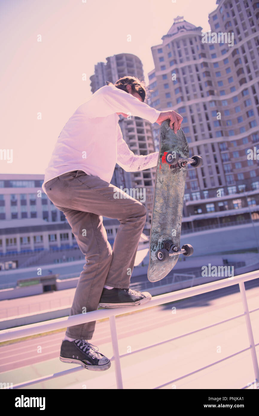 Active young man standing in semi position Stock Photo - Alamy
