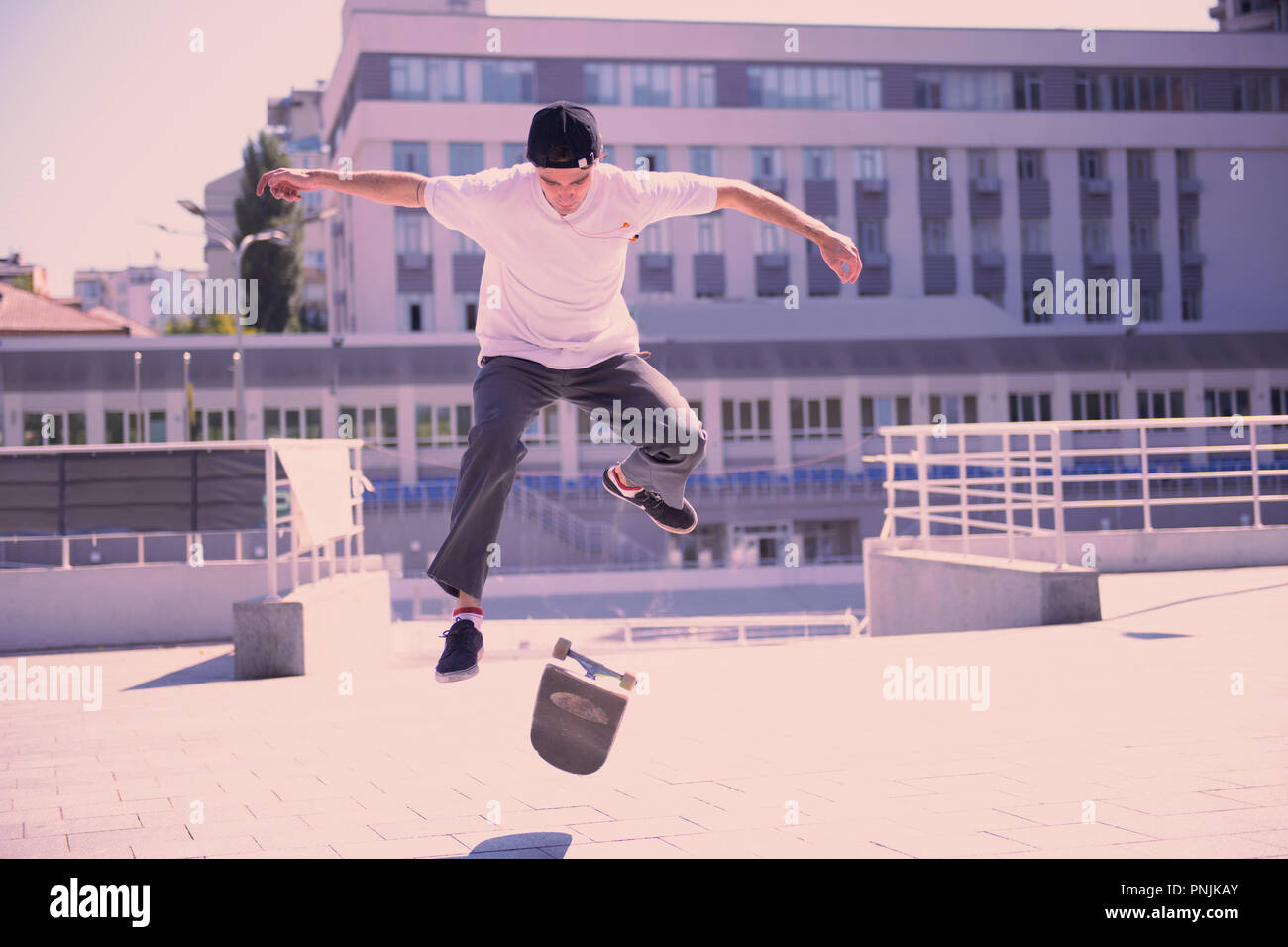 Joyful male person demonstrating his active lifestyle Stock Photo - Alamy