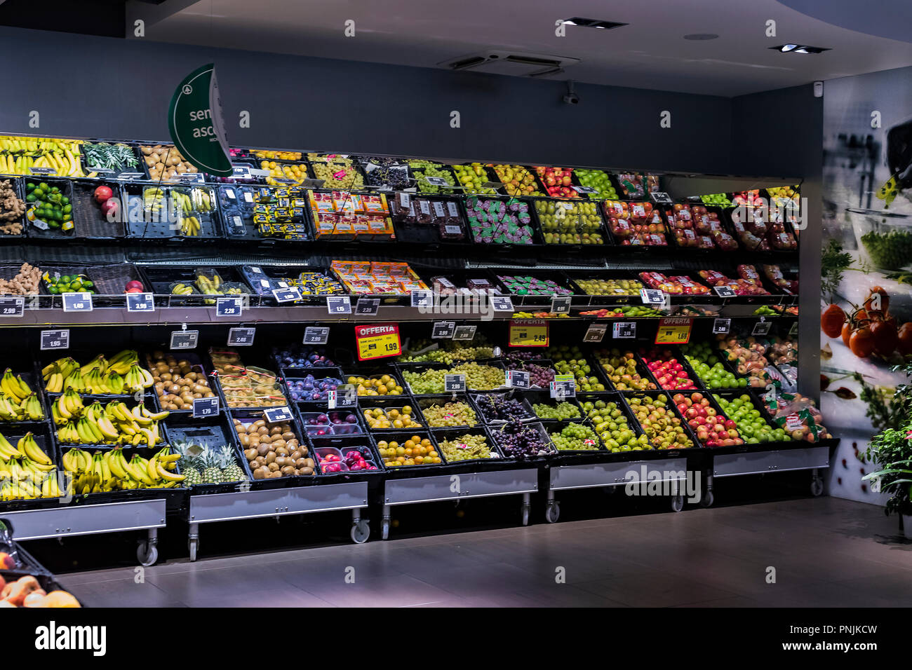 VERONA, ITALY - 4 SEPTEMBER: Shelves and shelving with products of ...