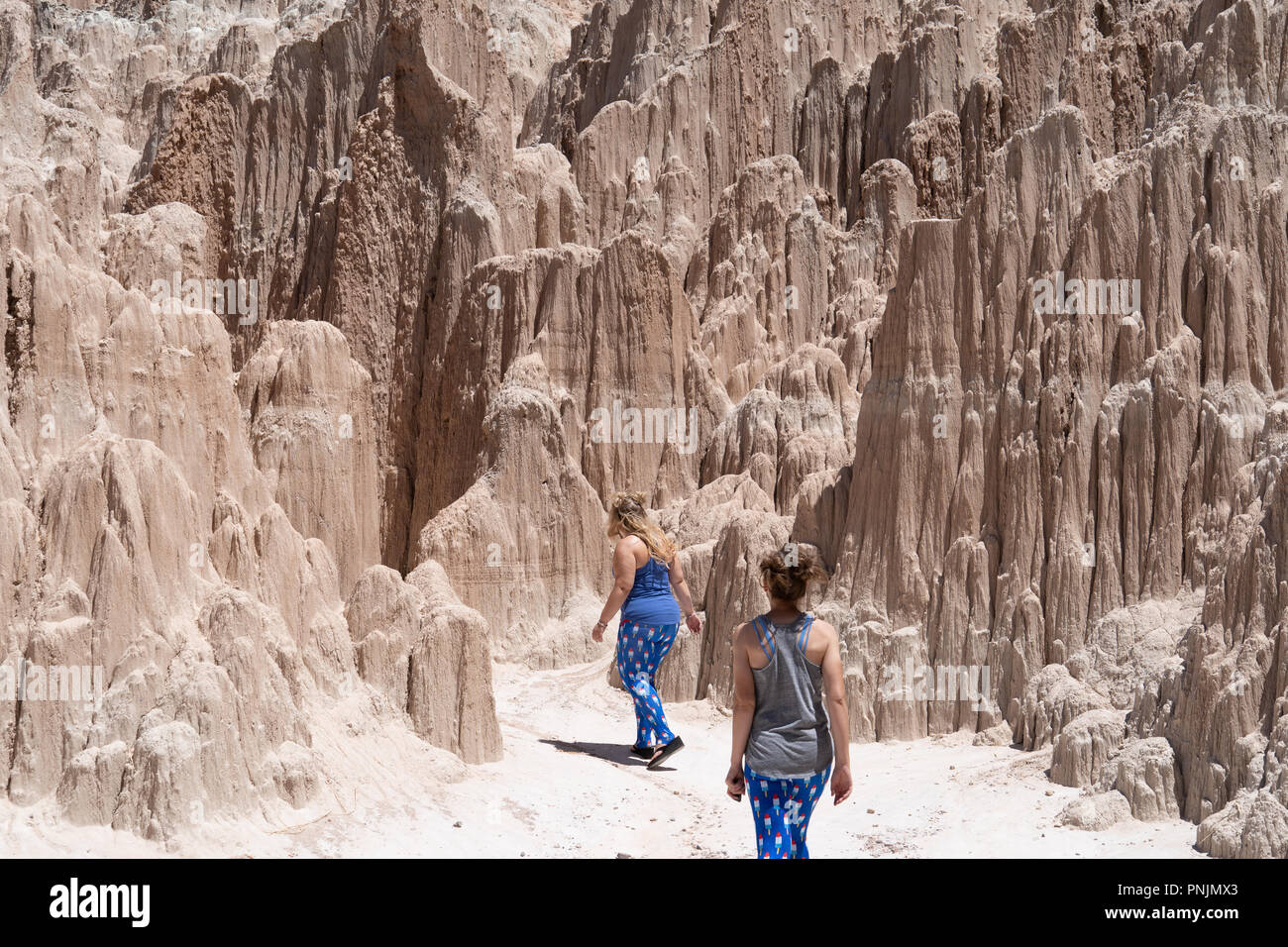 Two female hikers start their hike in Cathedral Gorge State Park ...