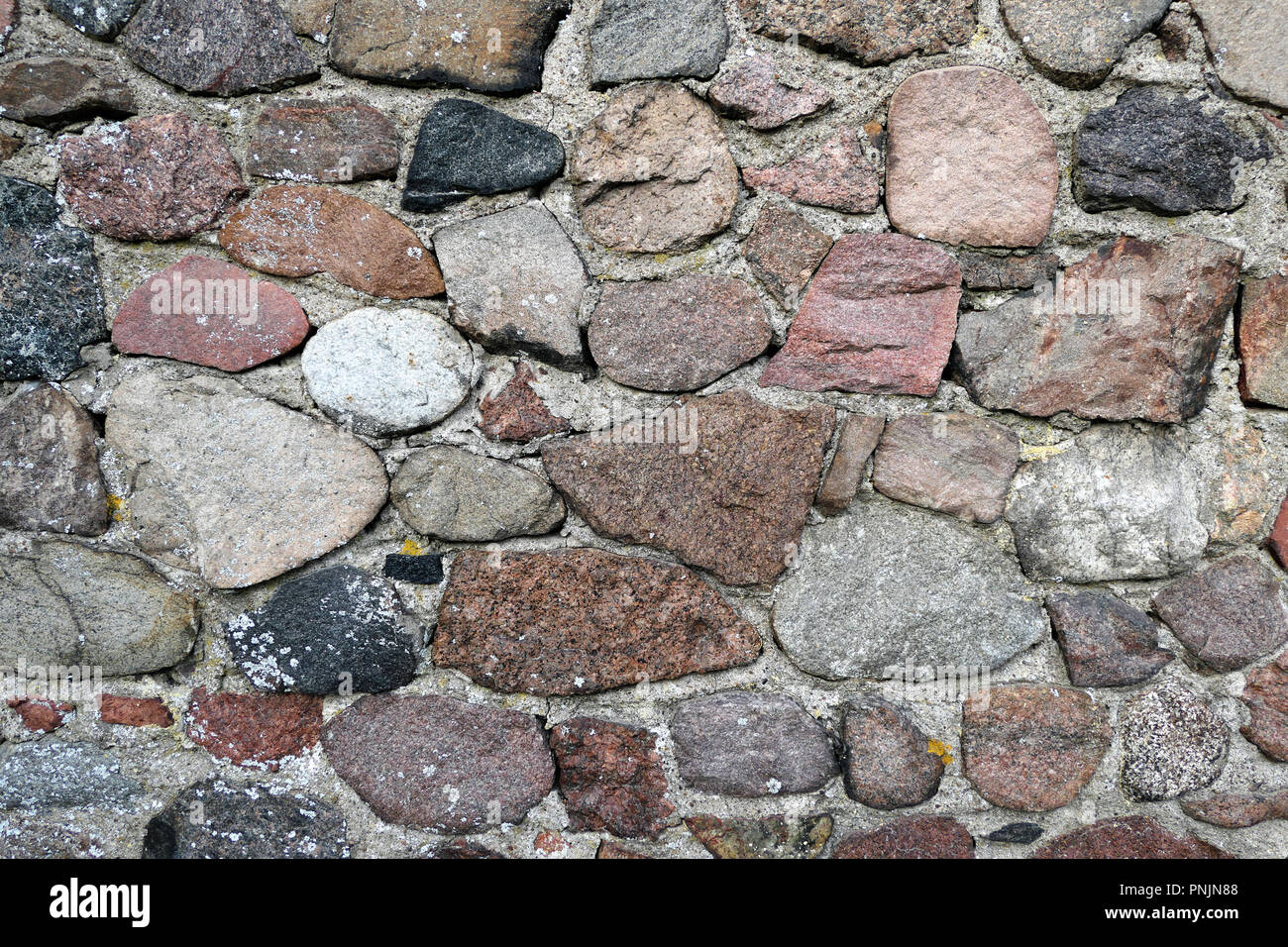old fieldstone wall of field rocks. full frame background Stock Photo ...