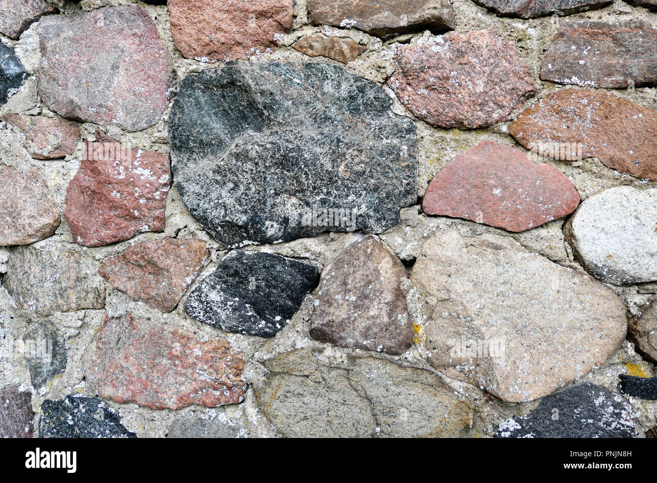 old fieldstone wall of field rocks. full frame background Stock Photo ...