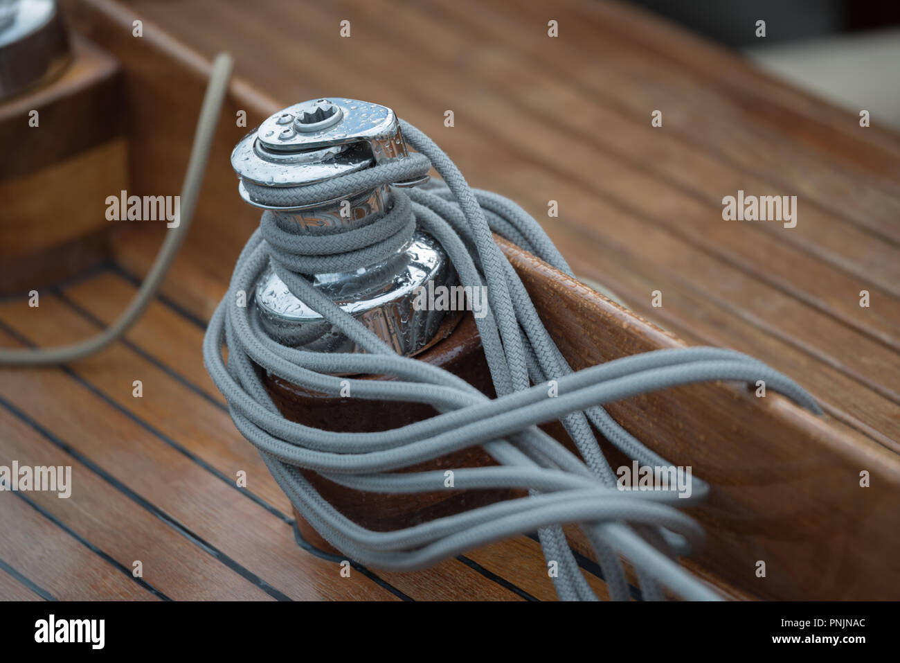 Nautical details on boat deck with ropes and marine tools Stock Photo ...