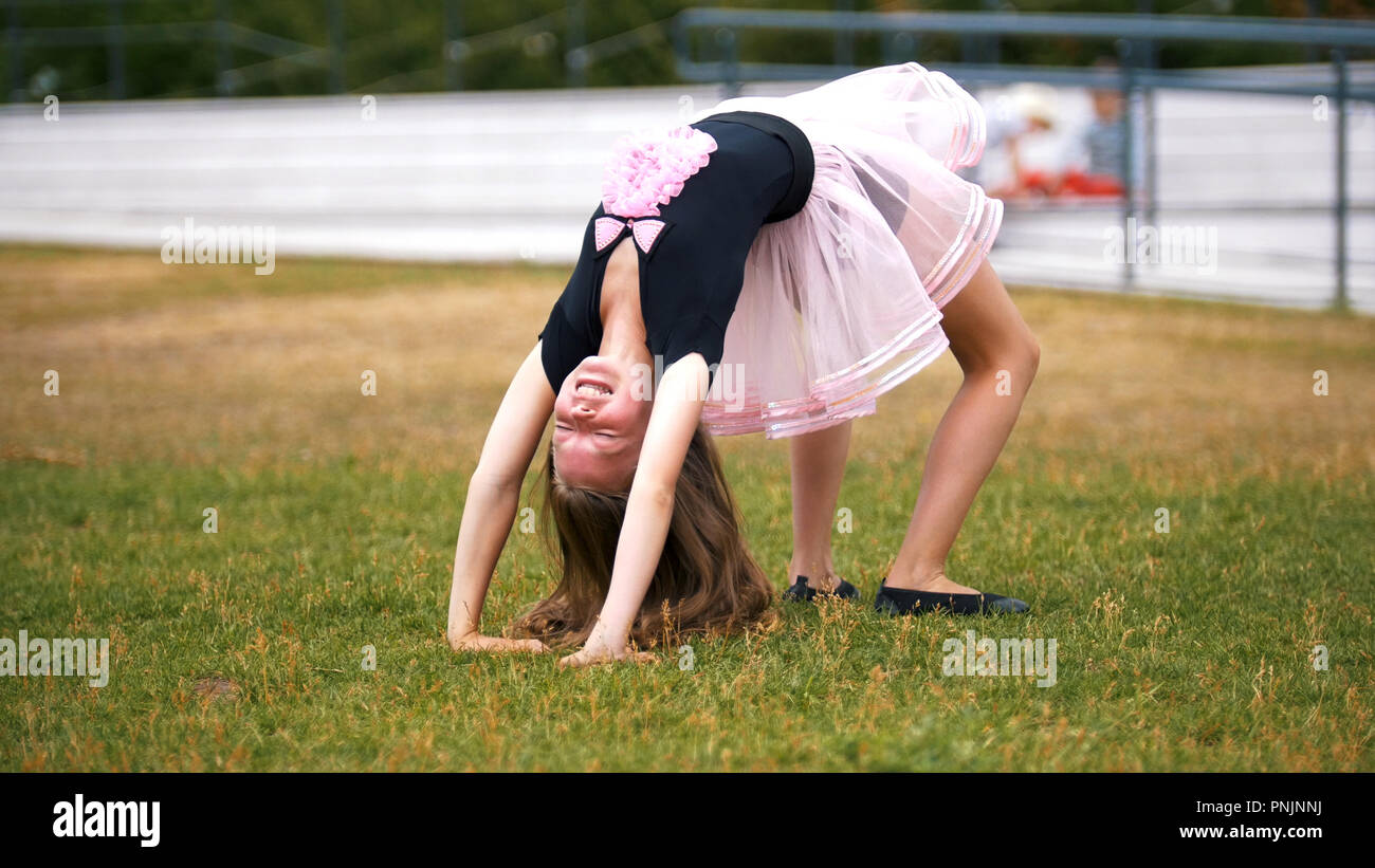 Cute girl doing bridge hi-res stock photography and images - Alamy