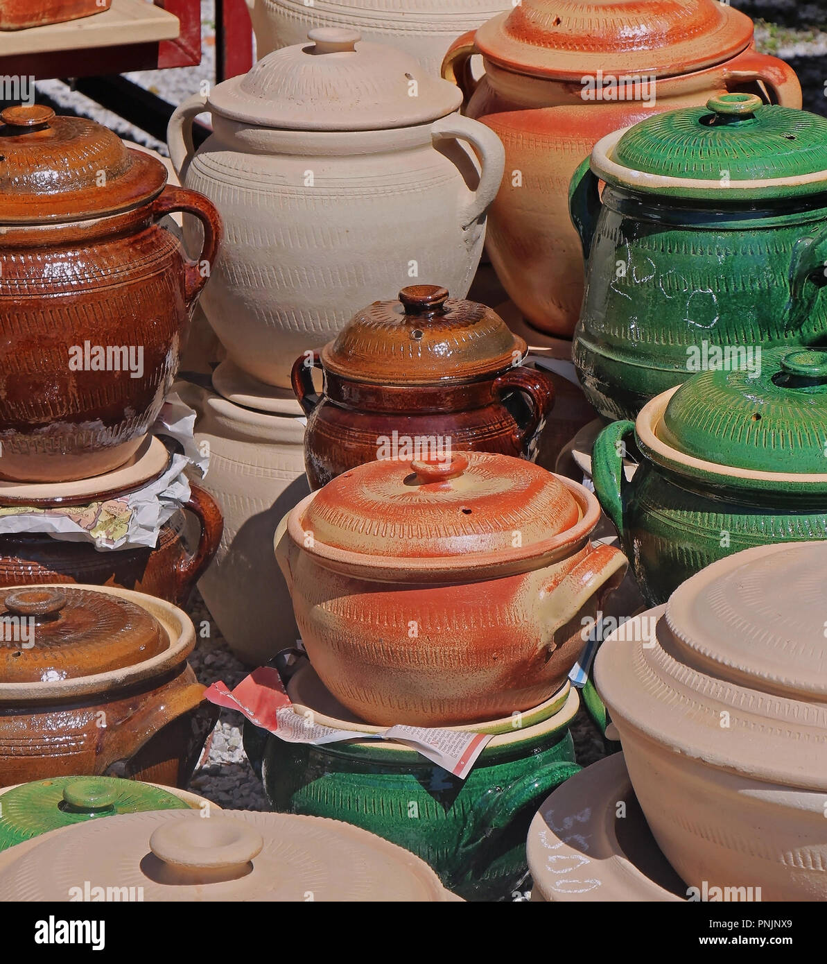 Crockery pots made in art and craft workshop sold on market Stock Photo ...