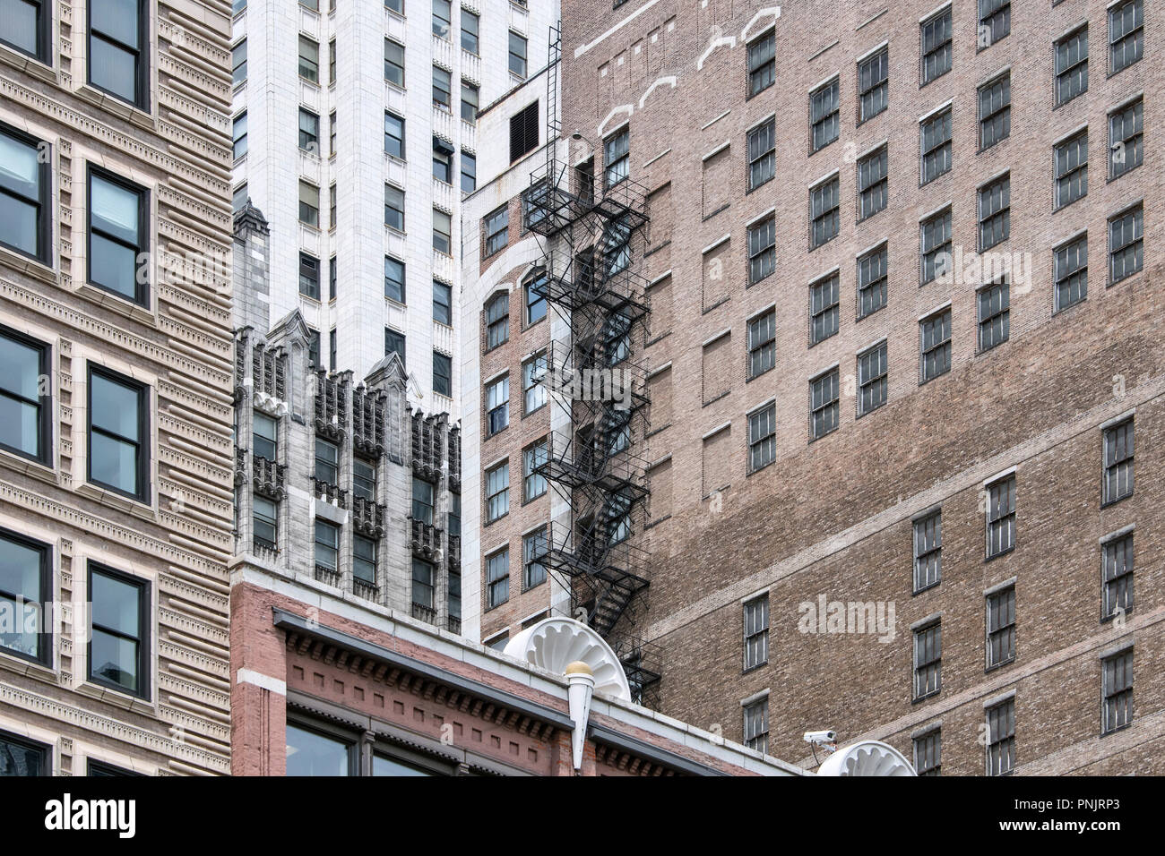 Detail of various building facades with fire escape, Downtown Chicago ...