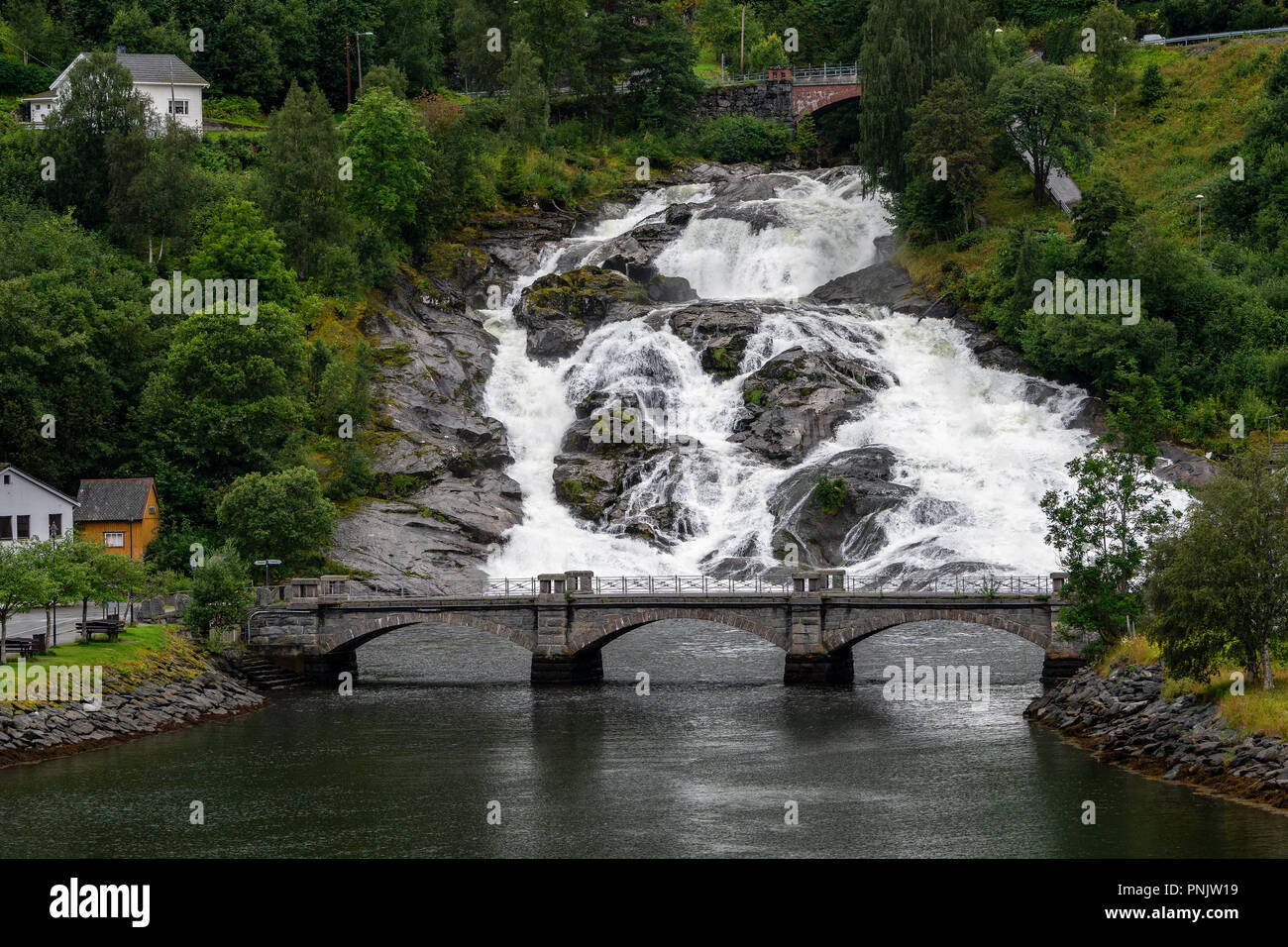 Waterfall with the bridges, Hellesyltfossen Stock Photo - Alamy