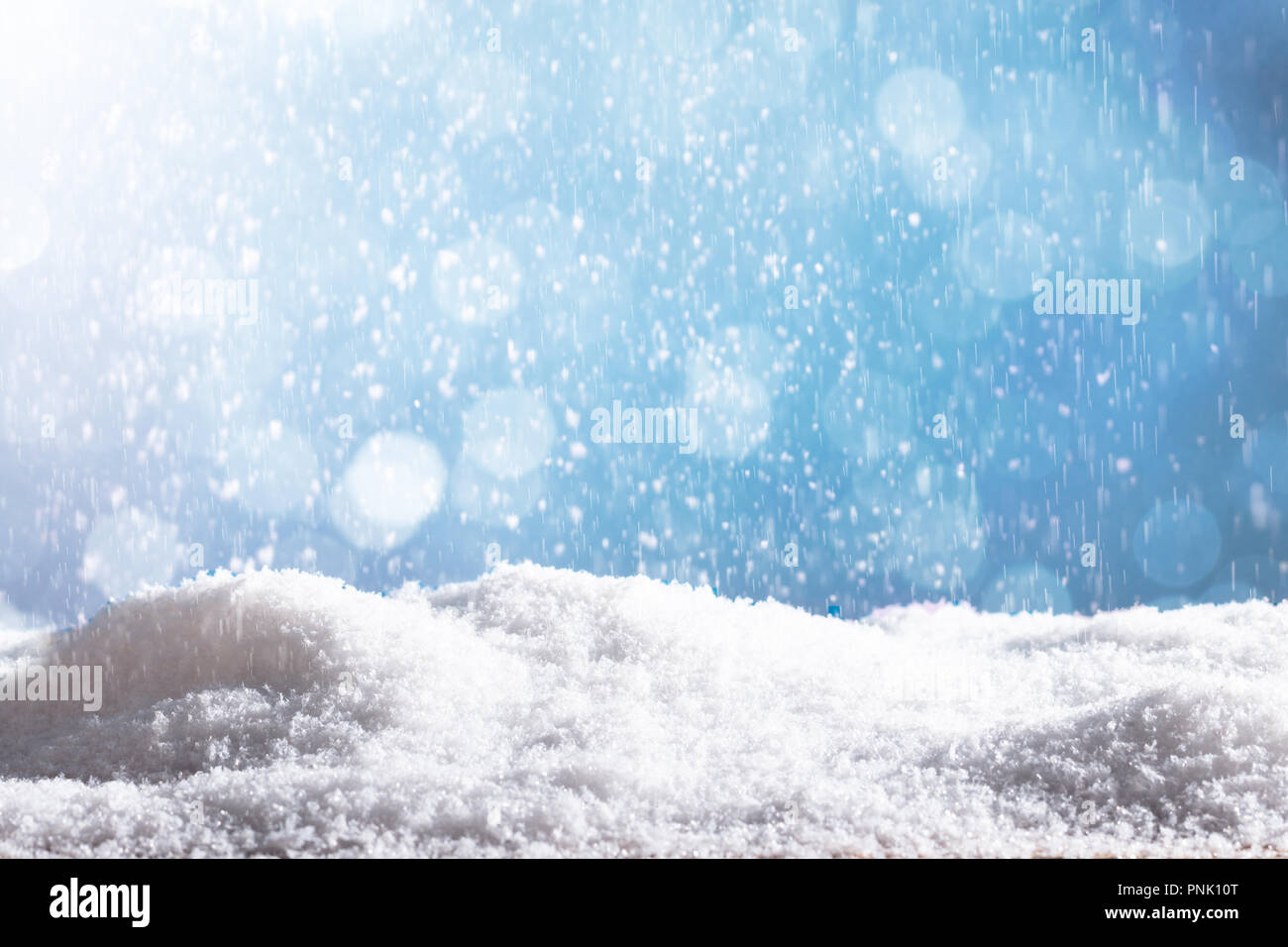 Sparkly particles falling down blue hi-res stock photography and images ...