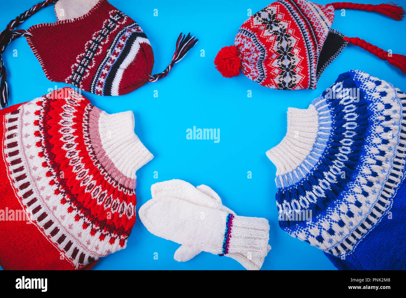 Winter female outfit. Set of clothes and accessories on blue background ...