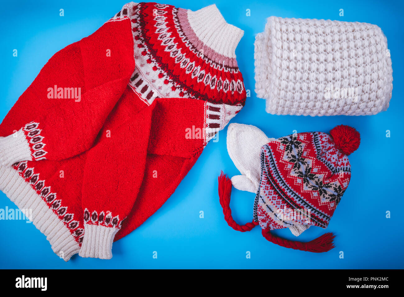 Winter female outfit. Set of clothes and accessories on blue background ...