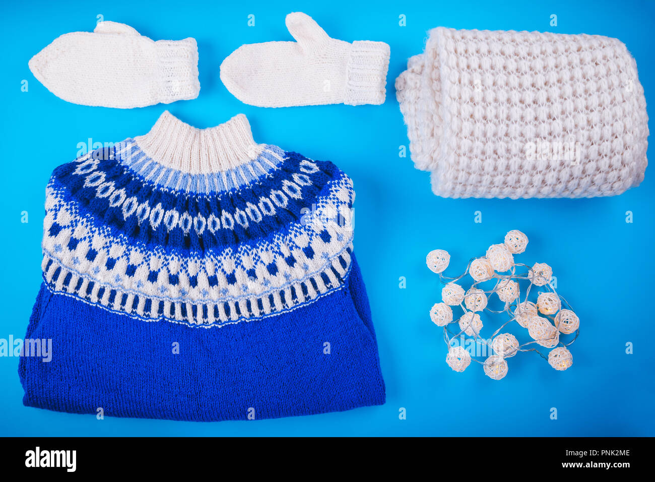 Winter female outfit. Set of clothes and accessories on blue background ...