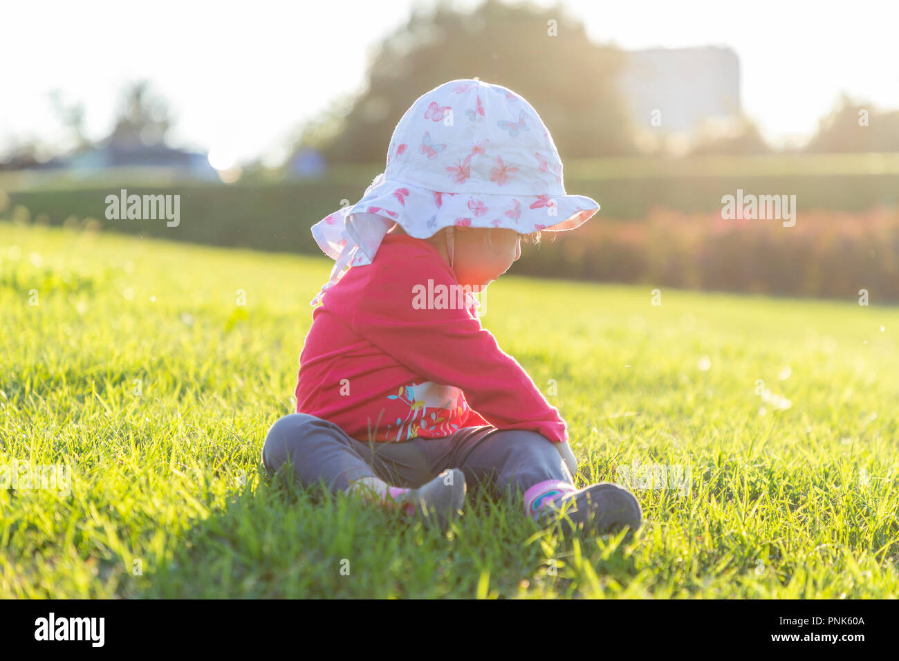 Happy baby sitting hi-res stock photography and images - Alamy