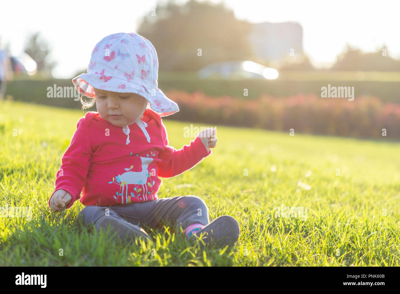 Happy baby sitting hi-res stock photography and images - Alamy