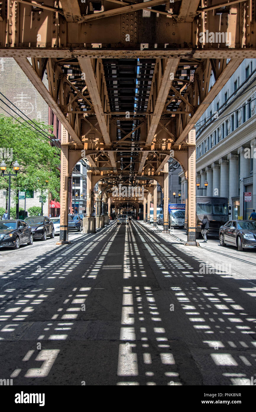 Street under the "L" elevated train, Downtown Chicago, IL Stock Photo ...