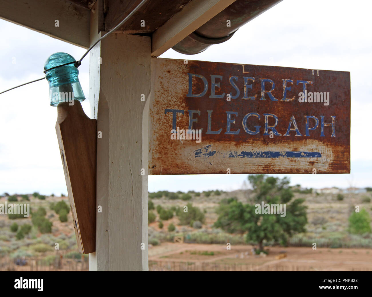 telegraph sign and telegraph wire attached to old insulator Stock Photo ...