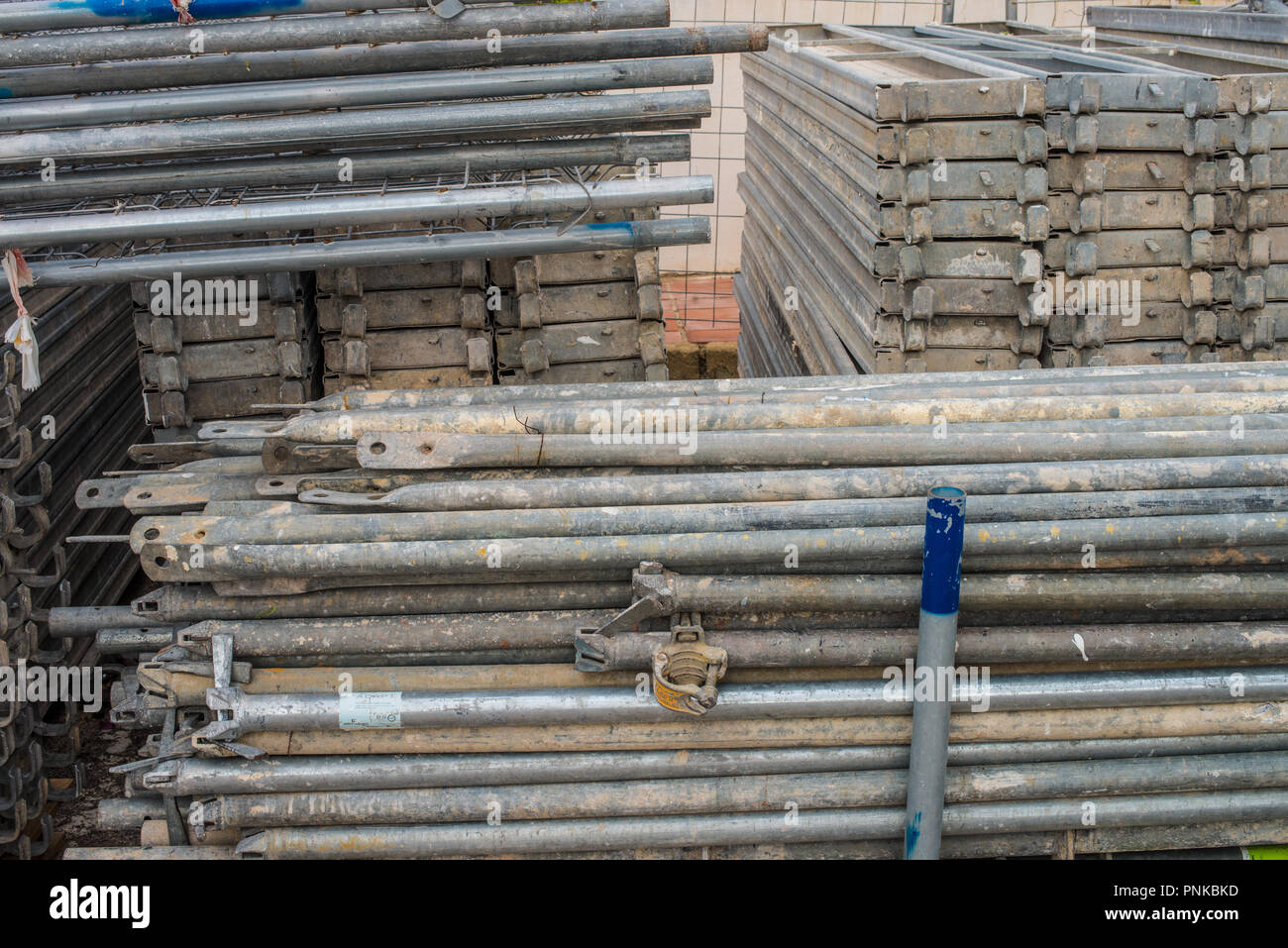 Assorted construction materials stored in piles Stock Photo - Alamy
