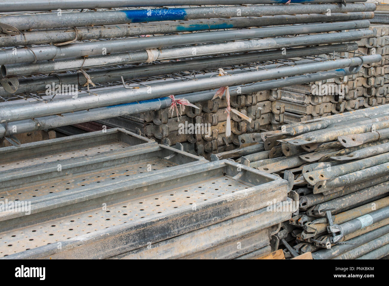 Assorted construction materials stored in piles Stock Photo - Alamy