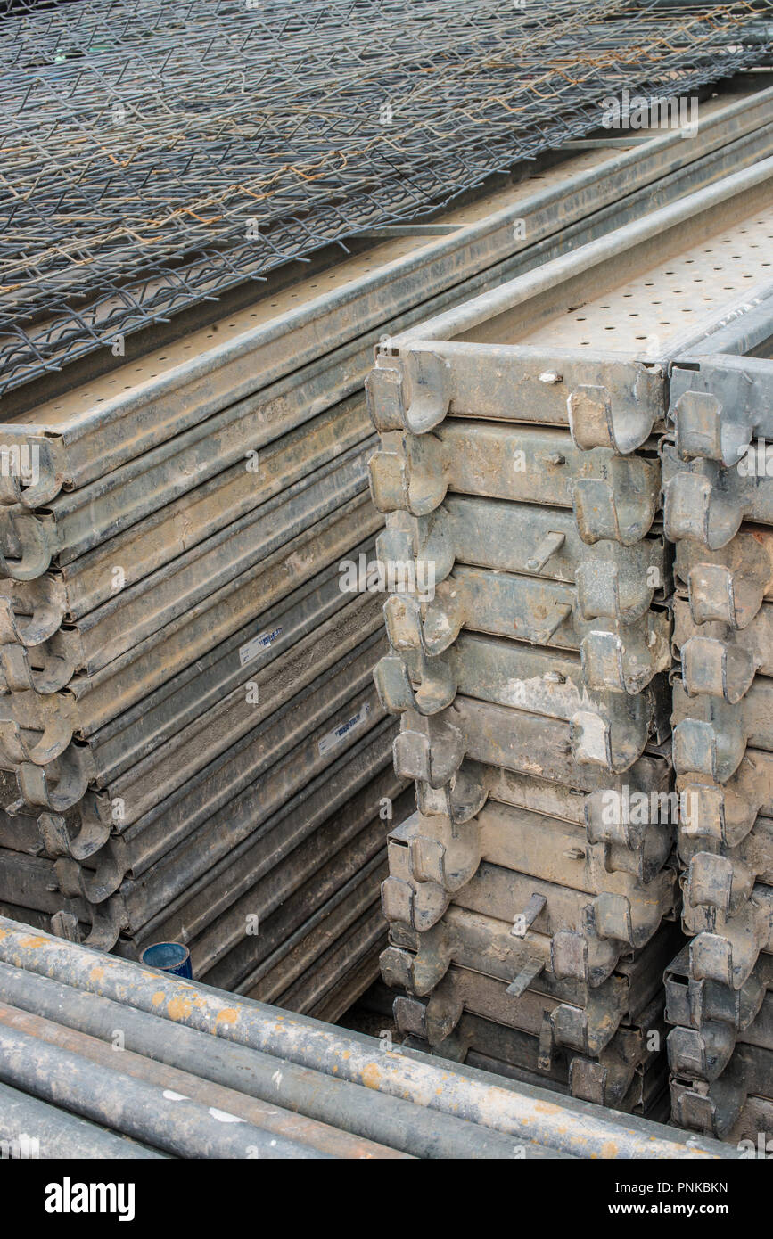 Assorted construction materials stored in piles Stock Photo - Alamy