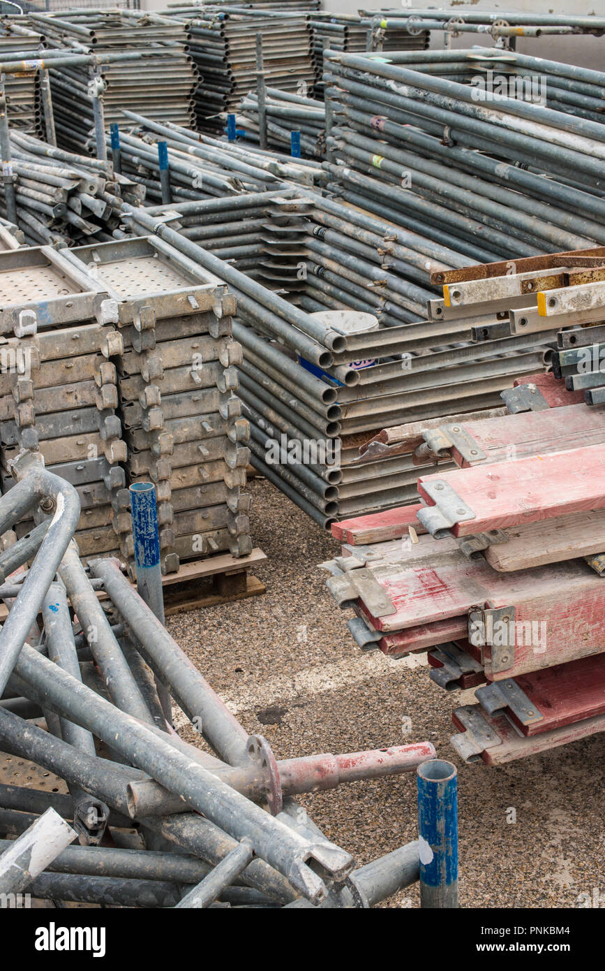 Assorted construction materials stored in piles Stock Photo - Alamy
