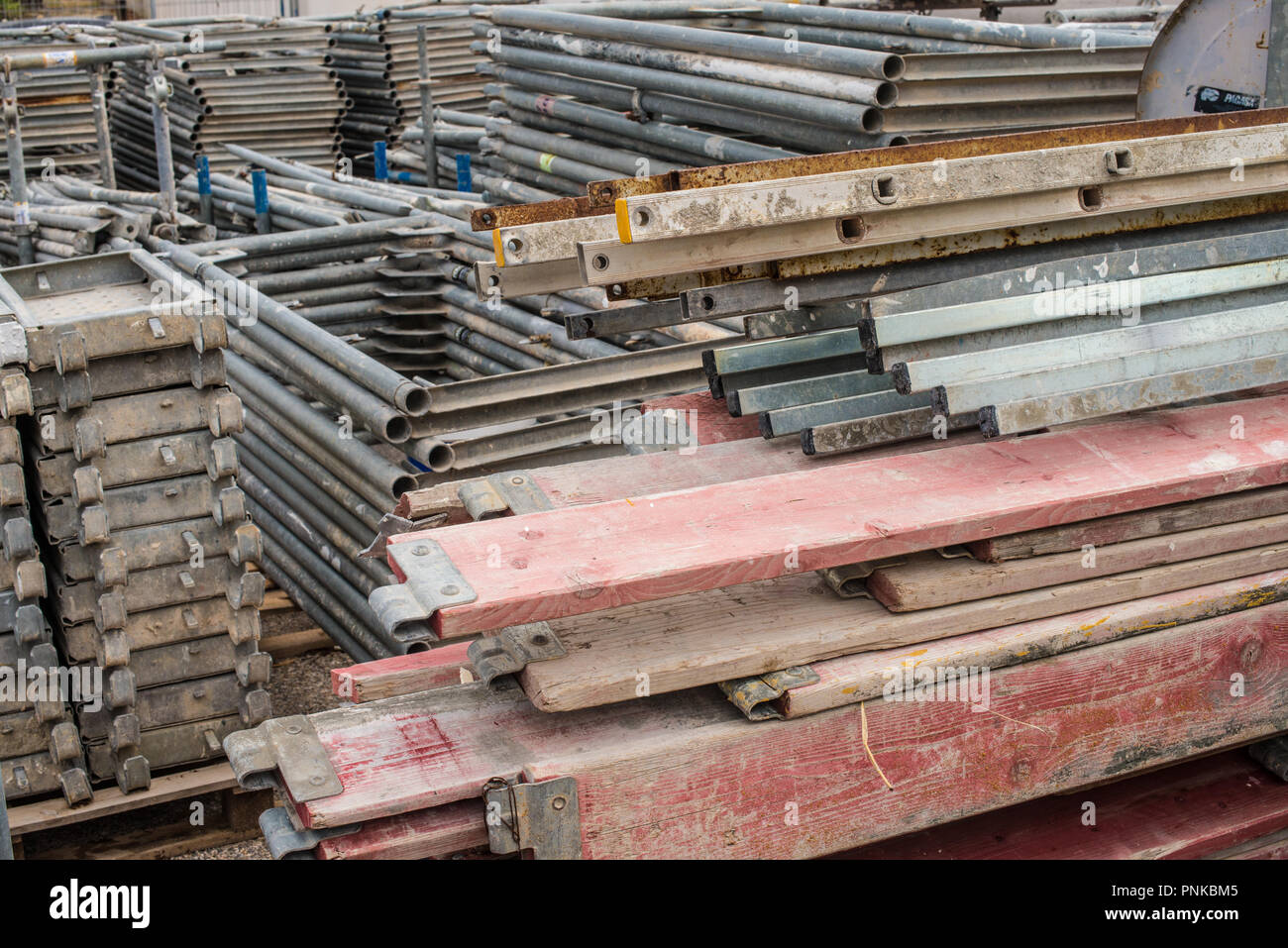 Assorted construction materials stored in piles Stock Photo - Alamy