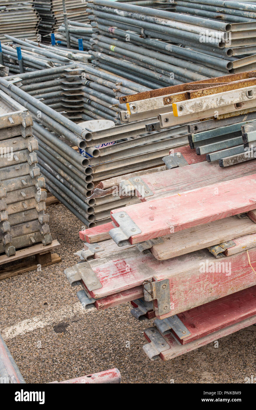 Assorted construction materials stored in piles Stock Photo - Alamy