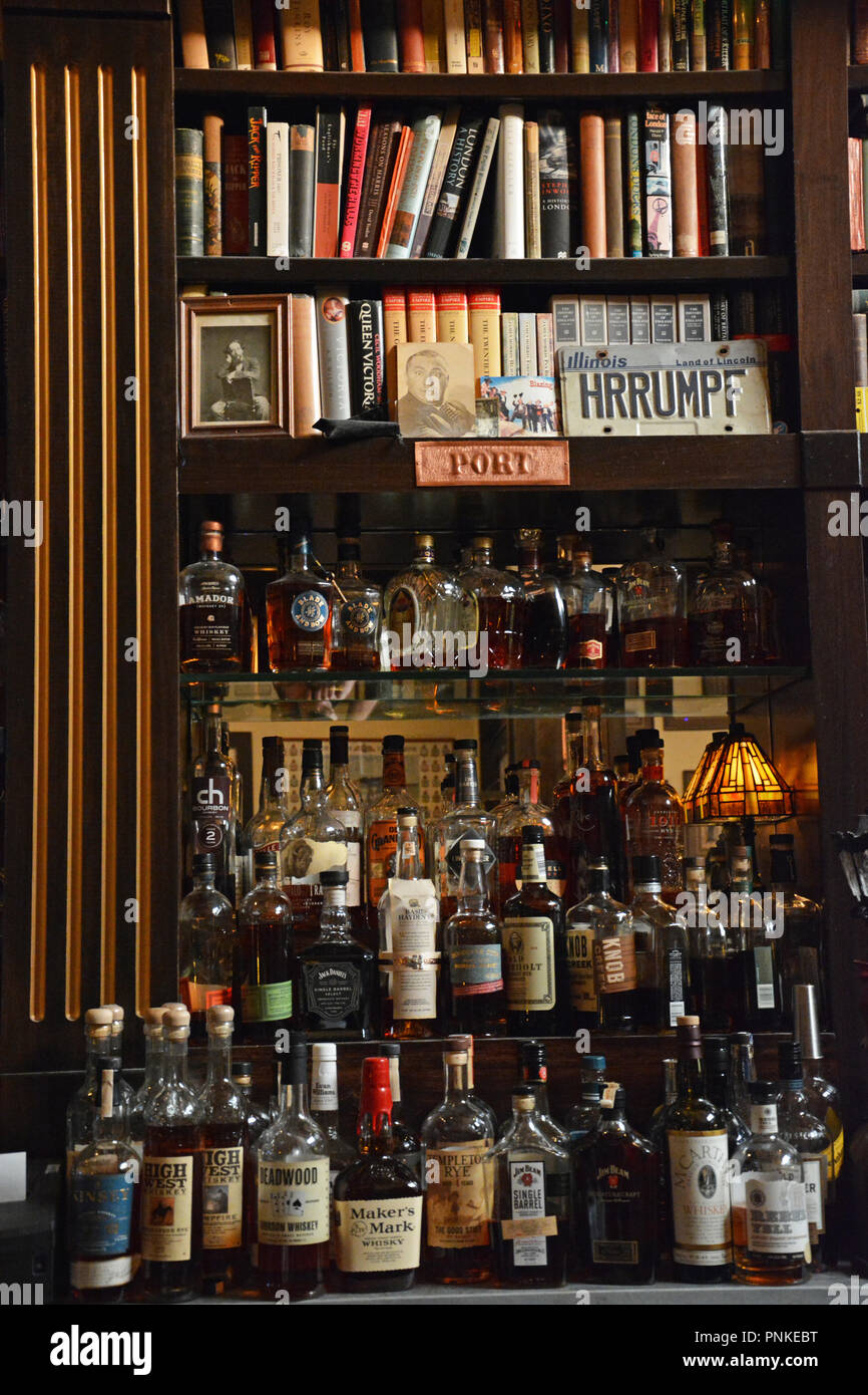 Detail of a back bar shelving that is doubling as a library at an ...
