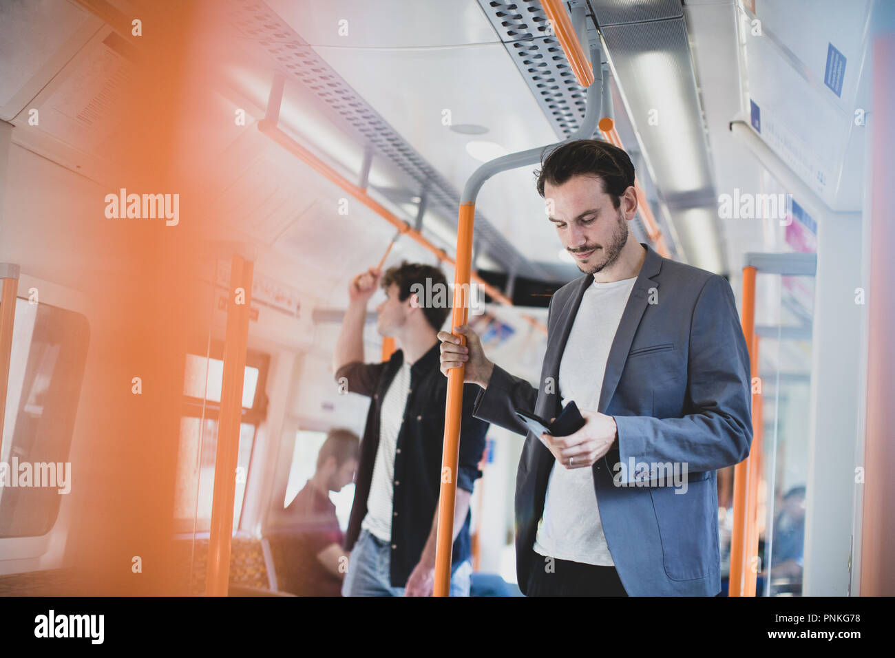 Commuter on train hi-res stock photography and images - Alamy